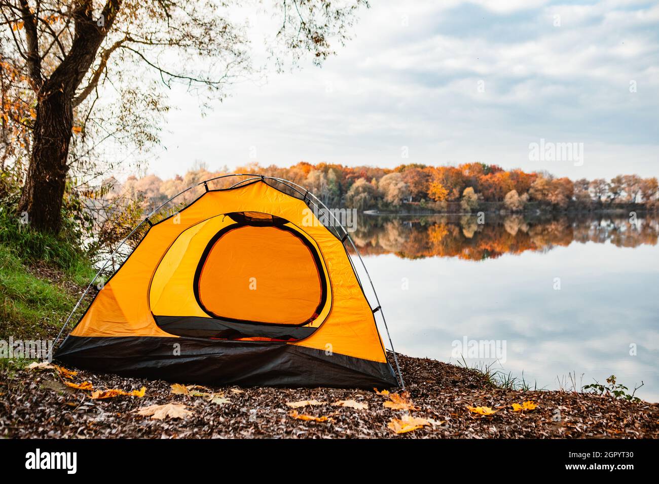 tent at the beach of the lake autumn fall season camping concept Stock ...