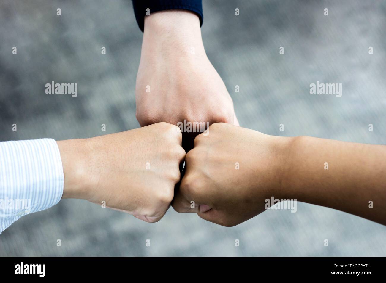 Team work three human hands hi-res stock photography and images - Alamy