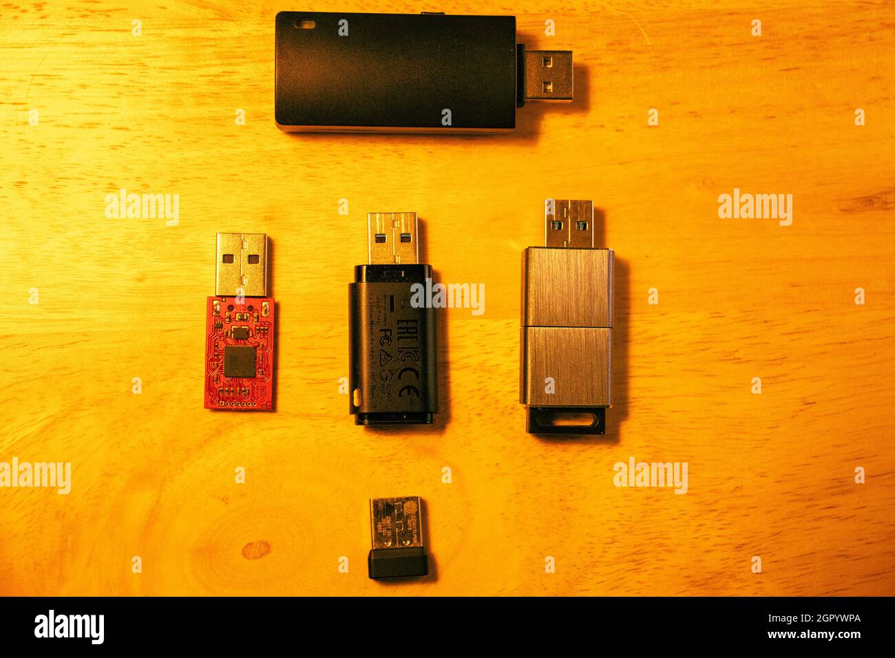 random items on a desk with a light colored wooden background Stock ...