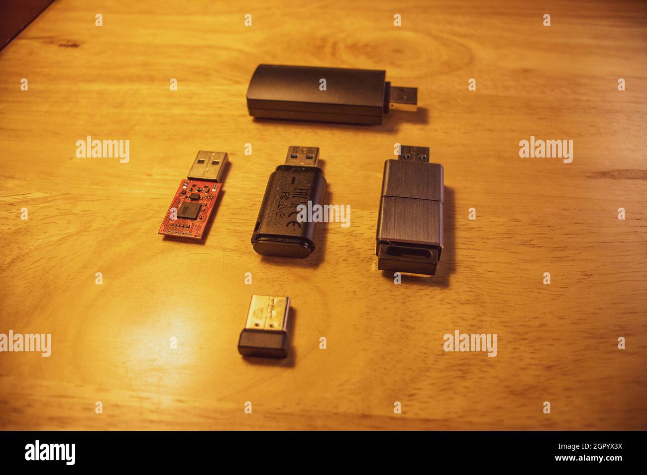 random items on a desk with a light colored wooden background Stock ...