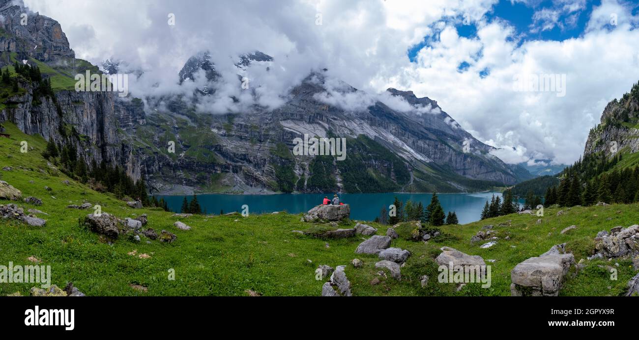 An attractive summer morning on the unique Oeschinensee Lake. A ...