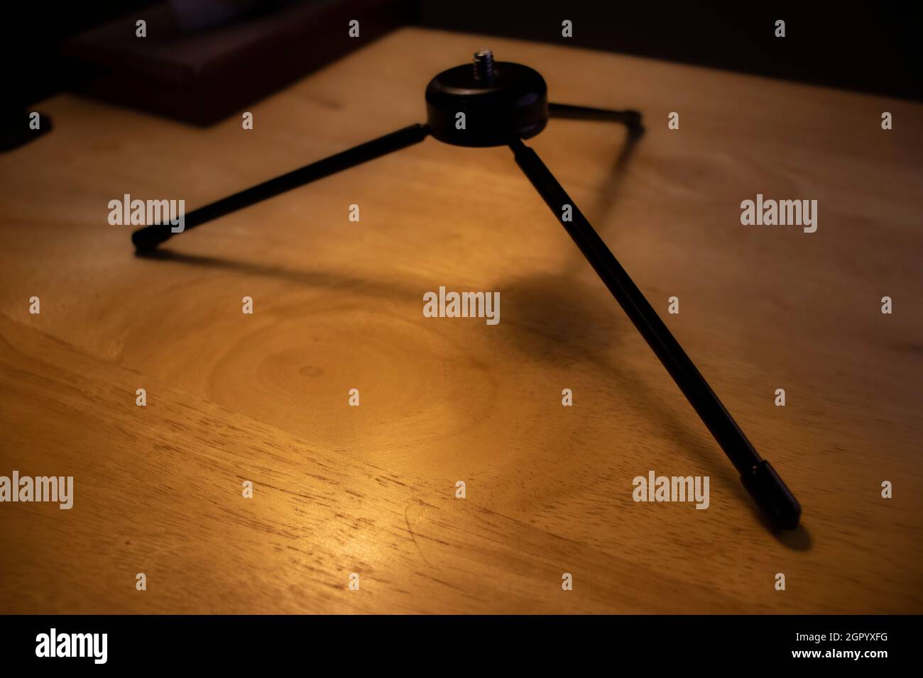 random items on a desk with a light colored wooden background Stock ...