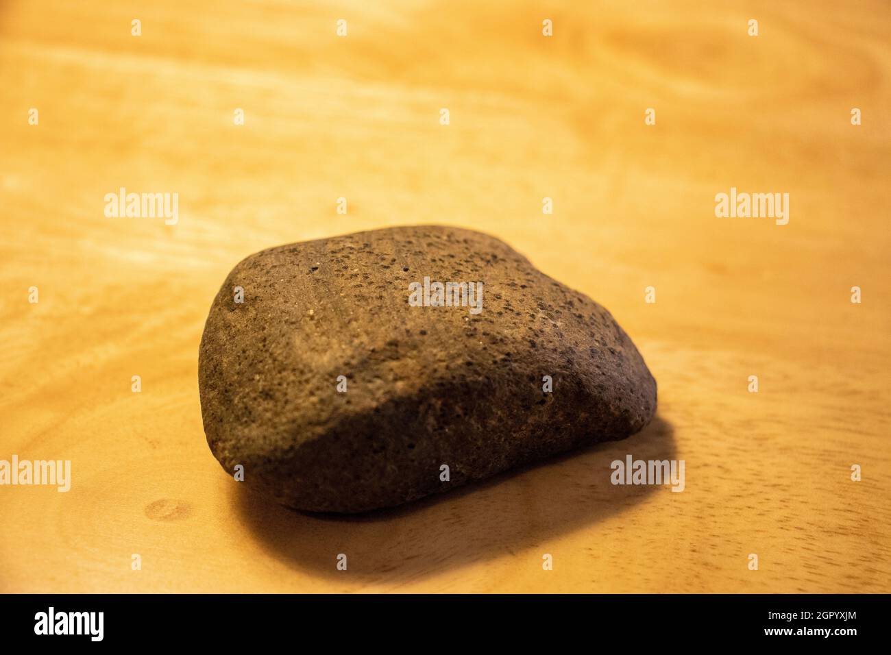 random items on a desk with a light colored wooden background Stock ...