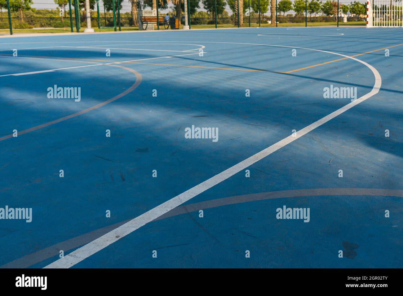 Close up of basketball court blue material and lines for outdoor sports ...