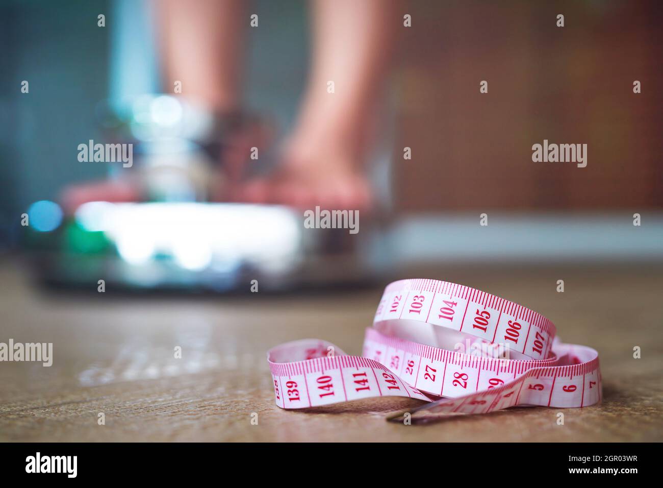 Child obese scales hi-res stock photography and images - Alamy