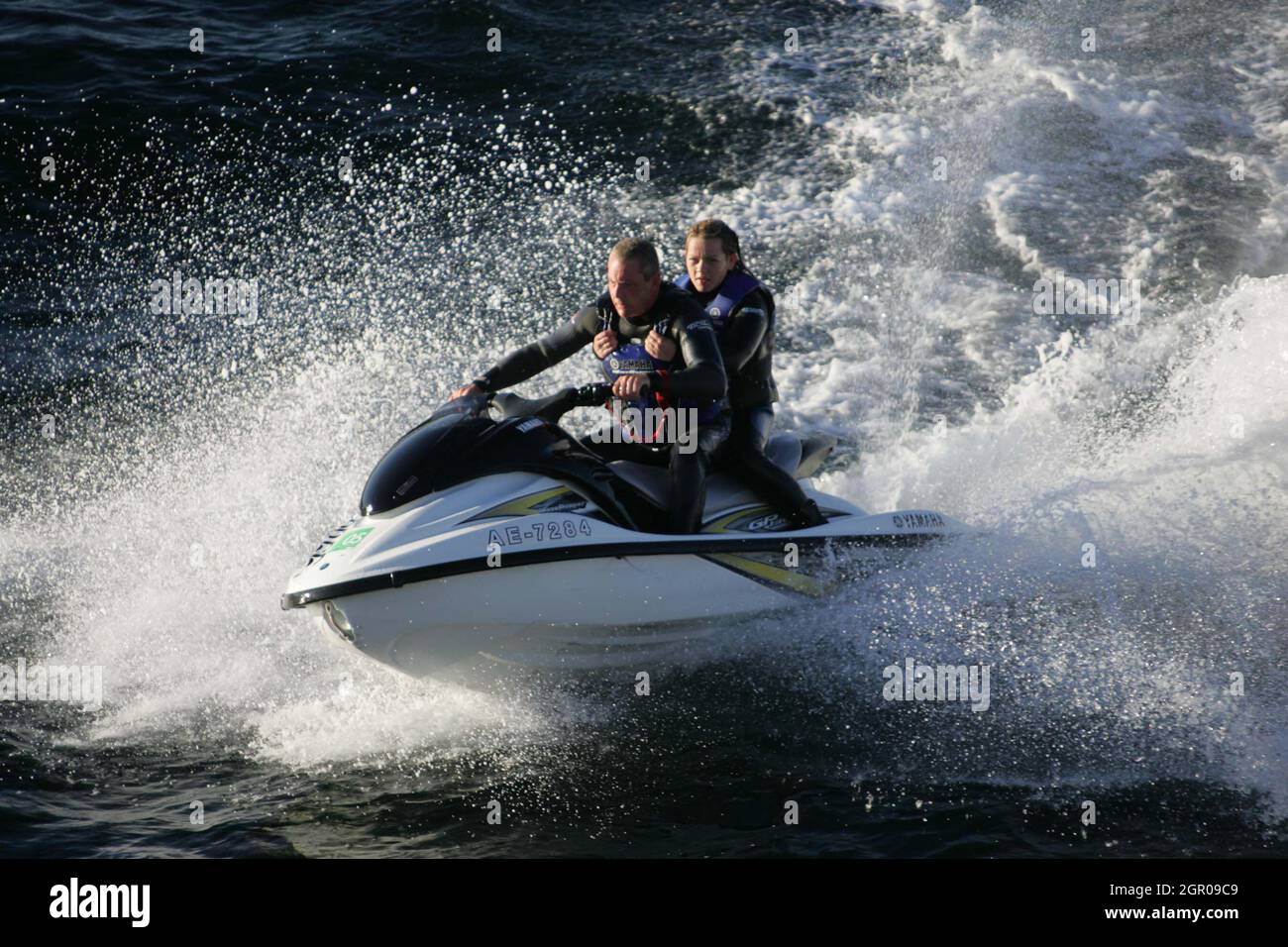 Firth of Clyde Scotland, UK 2005. A Jet Ski buzzs around the Caledonian ...