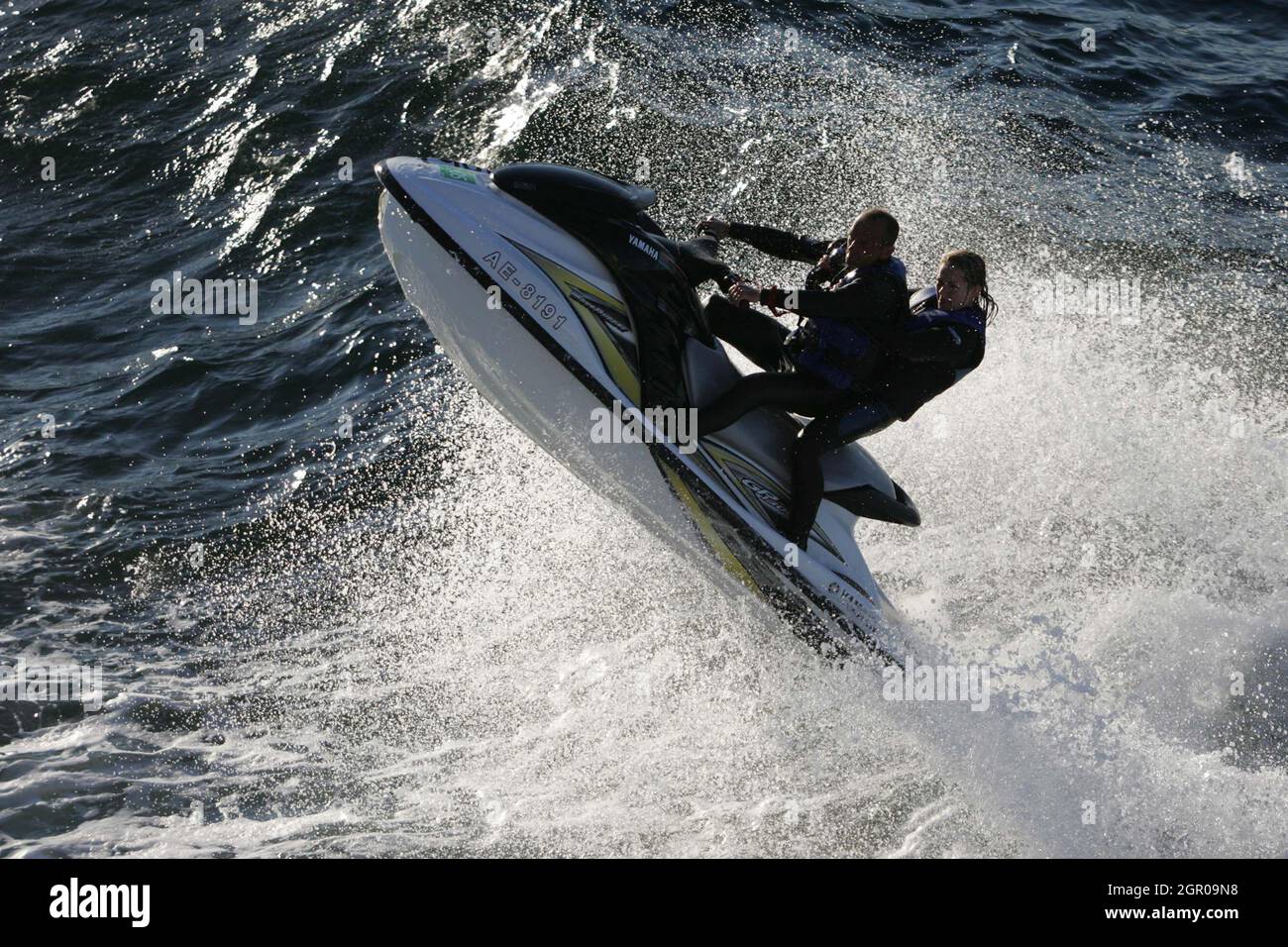Firth of Clyde Scotland, UK 2005. A Jet Ski buzzs around the Caledonian ...