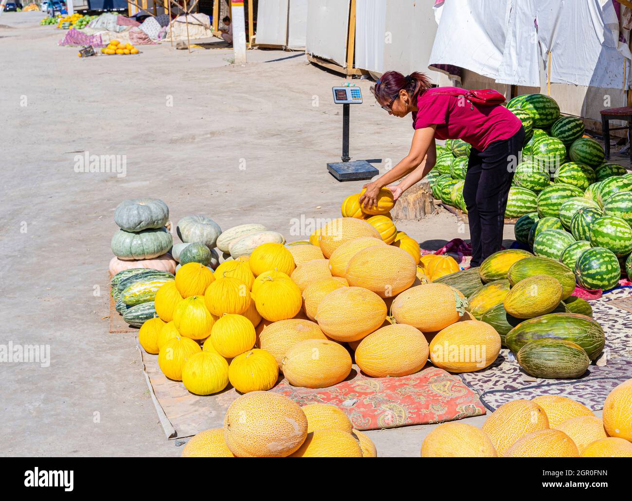 Melons Woman High Resolution Stock Photography and Images - Alamy