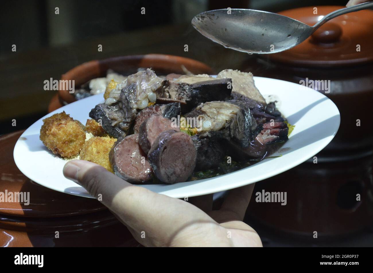 Serving feijoada hi-res stock photography and images - Alamy
