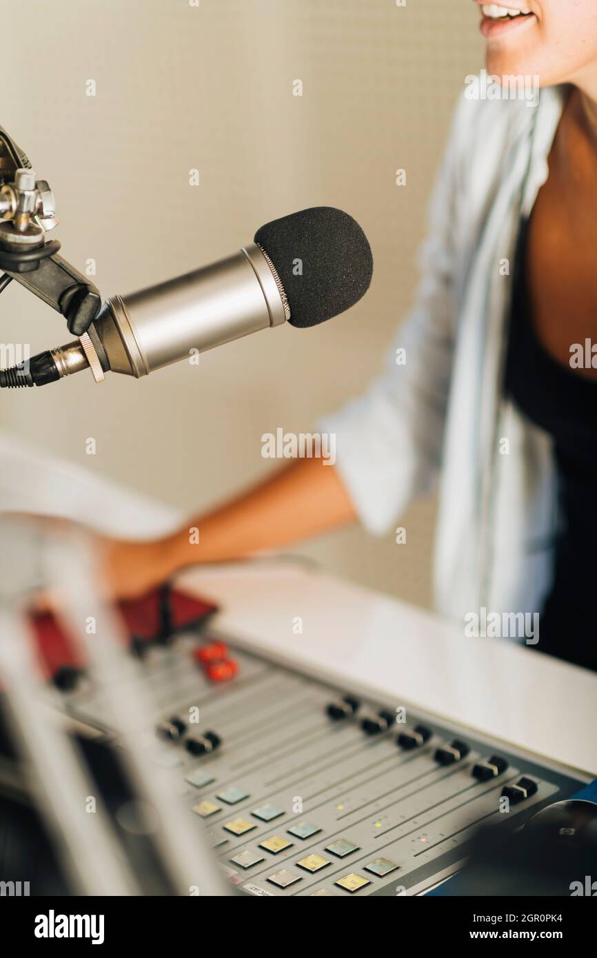 Commentator talking speaking into microphone hi-res stock photography ...