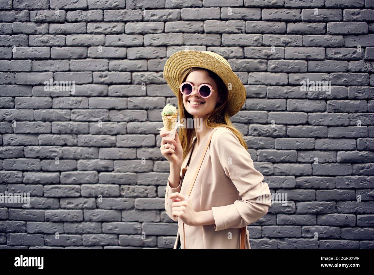 beautiful woman outdoor walk eat ice cream walk travel fun Stock Photo ...