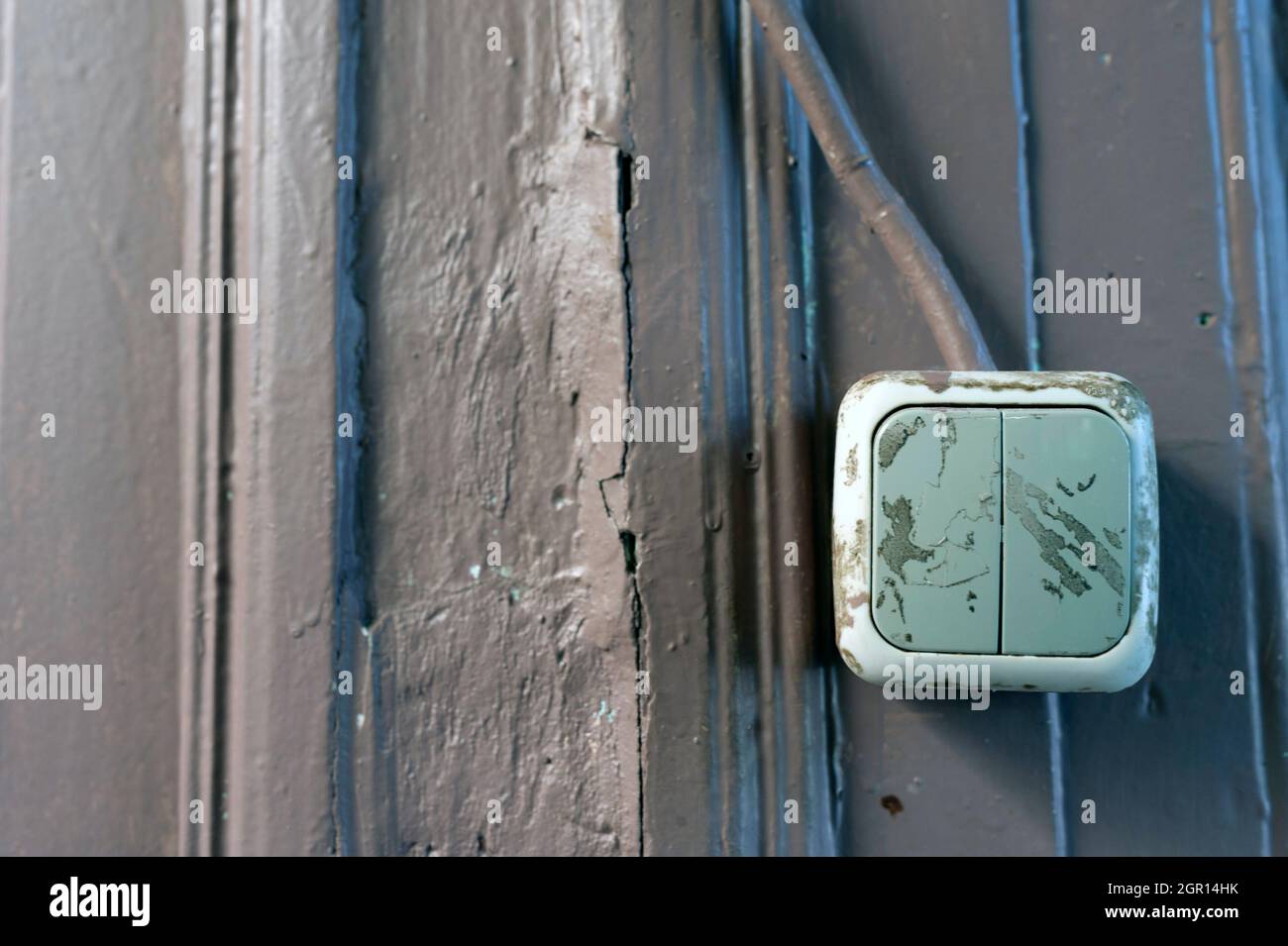 Old Electrical switch on the old weathered wall, old light switch Stock ...