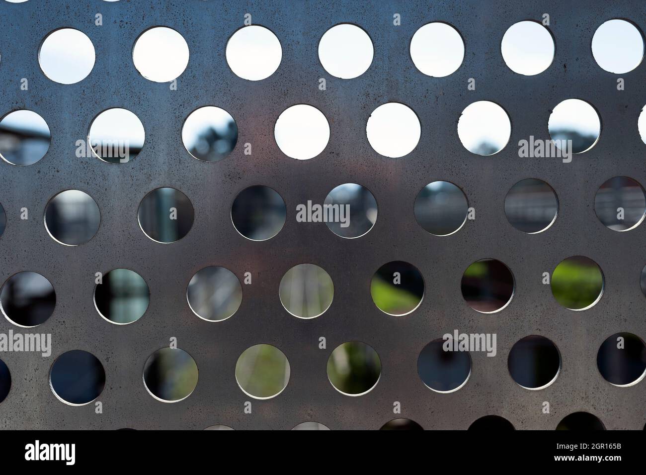 Perforated metal surface Stock Photo - Alamy