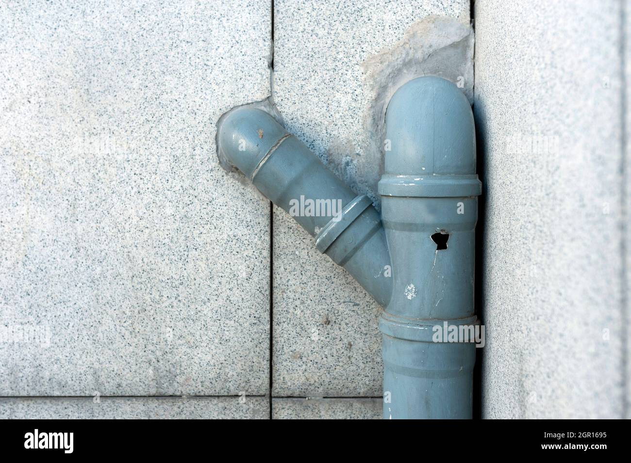 Perforated plastic pipe, damaged pipe, punched plastic pipe Stock Photo ...