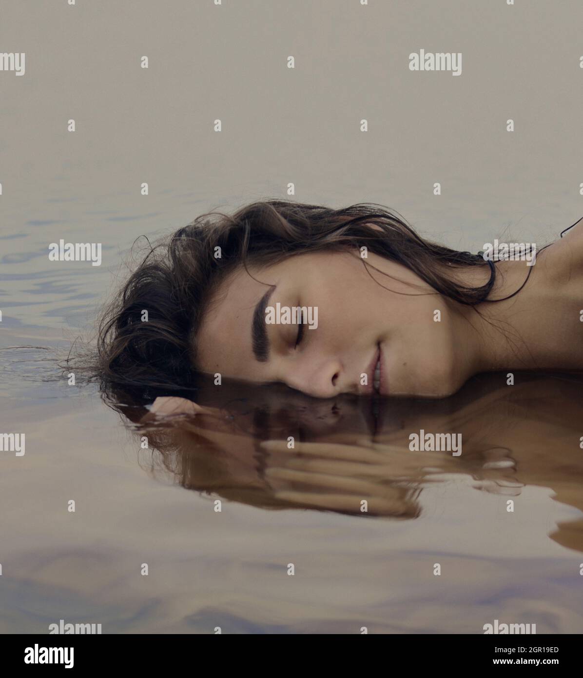 Woman floating face down in High Resolution Stock Photography and ...