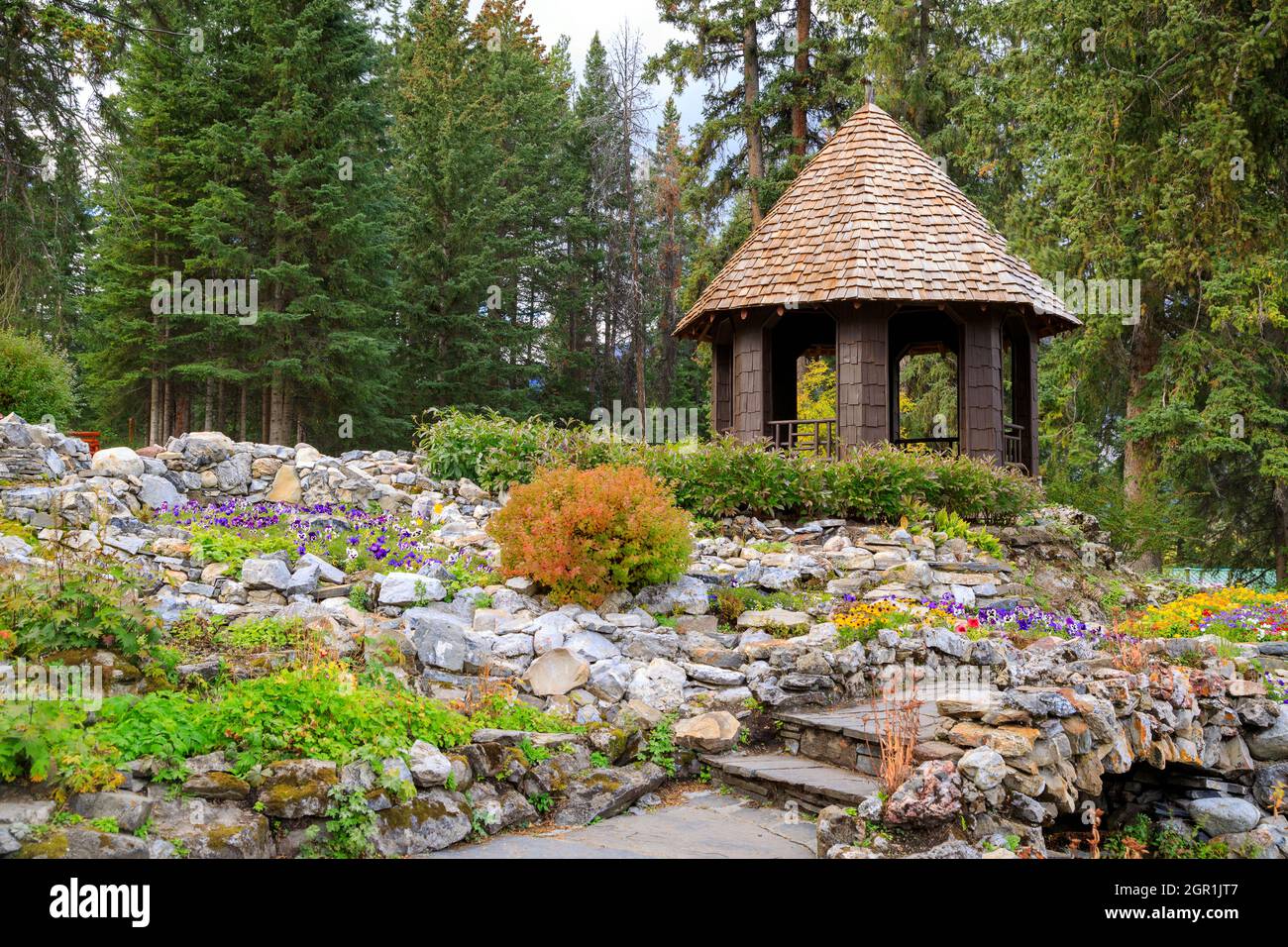 A wooden gazebo in a park in Banff National Park in the town of Banff ...
