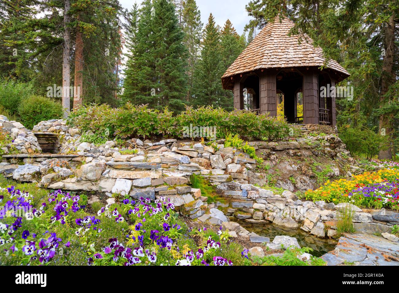 A wooden gazebo in a park in Banff National Park in the town of Banff ...