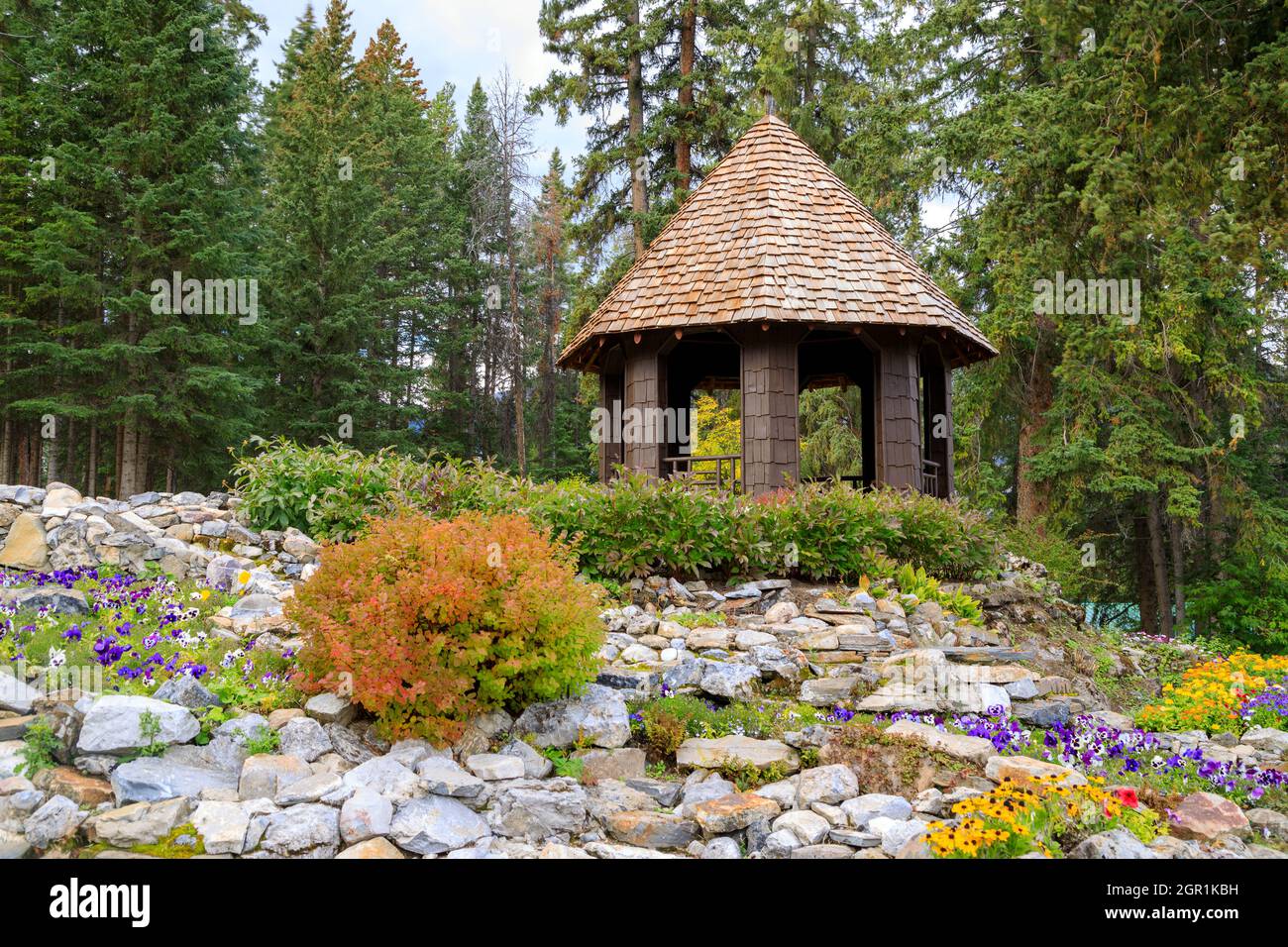 A wooden gazebo in a park in Banff National Park in the town of Banff ...