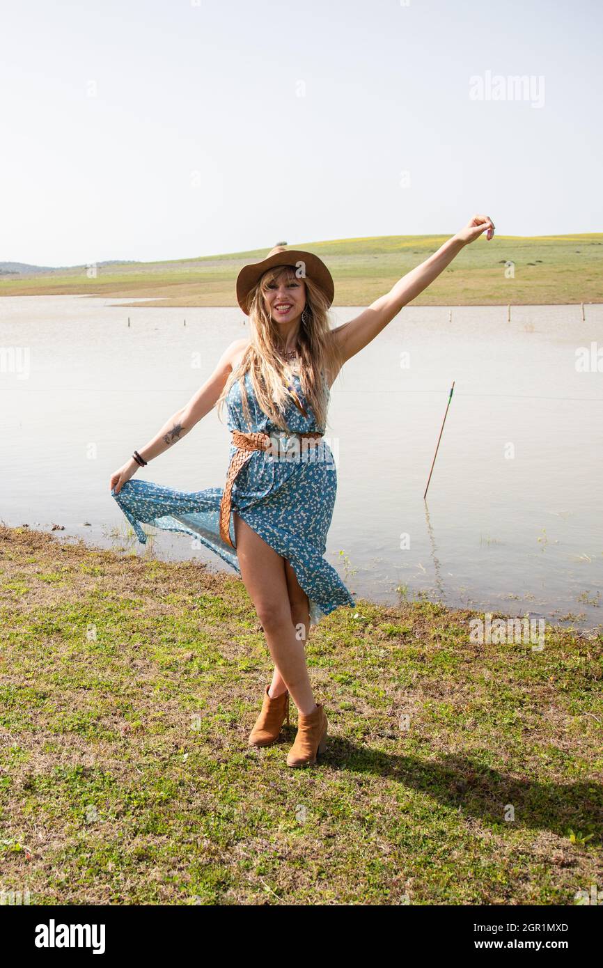 Young blonde boho female beauty on a nature background Stock Photo - Alamy