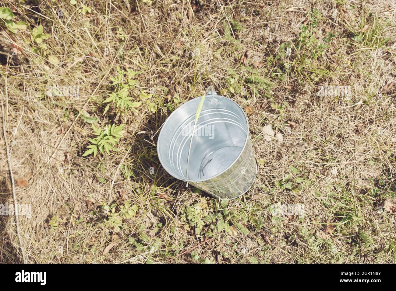 iron bucket countryside nature lifestyle Stock Photo - Alamy