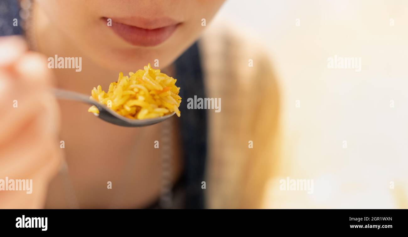 Hand spoon lips hi-res stock photography and images - Alamy