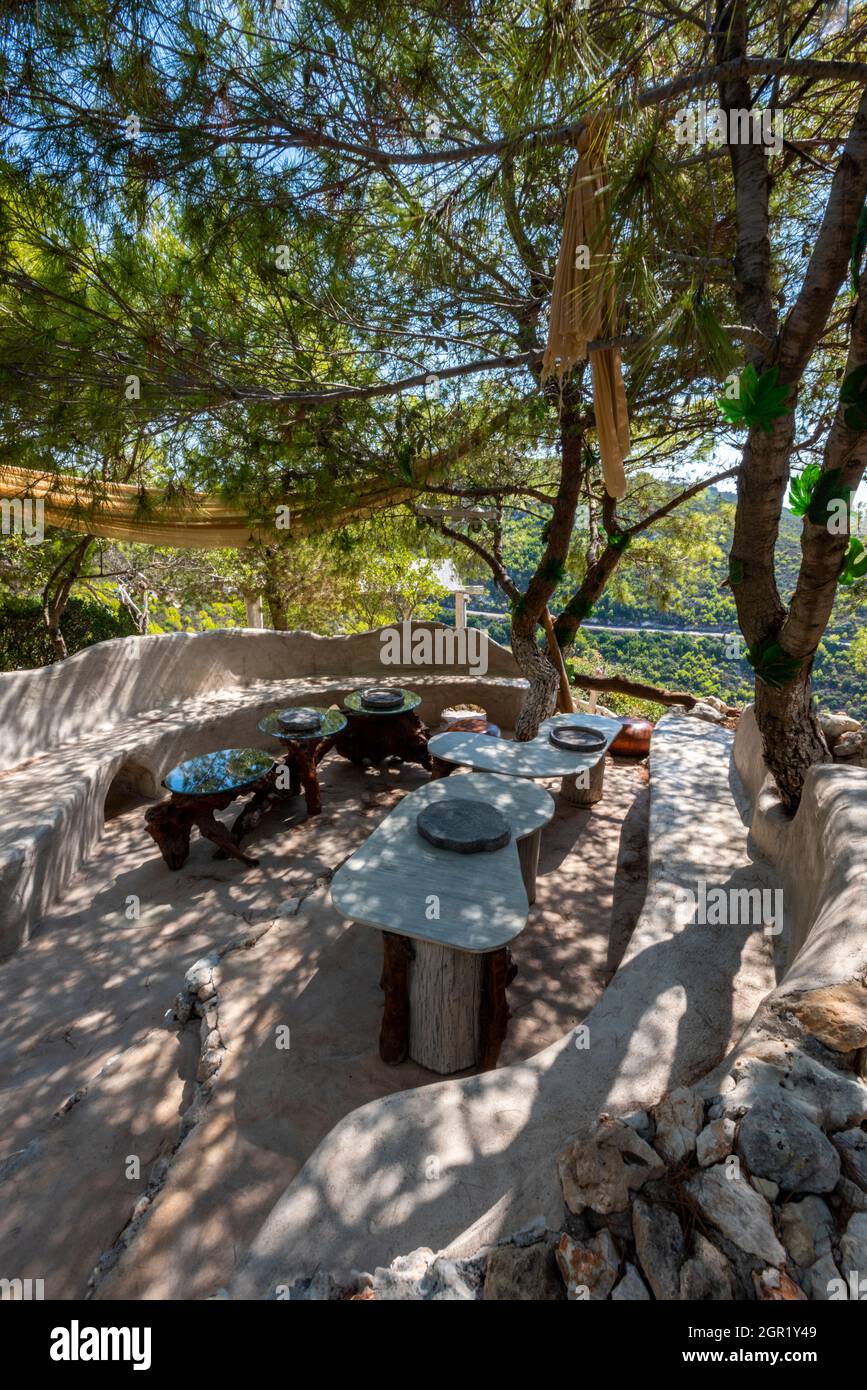 bespoke artistic seating at taverna at damianos caves on the greek ...