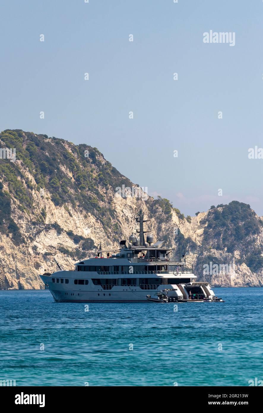 large luxury motorboat or motor cruiser anchored in a bay off on turtle ...