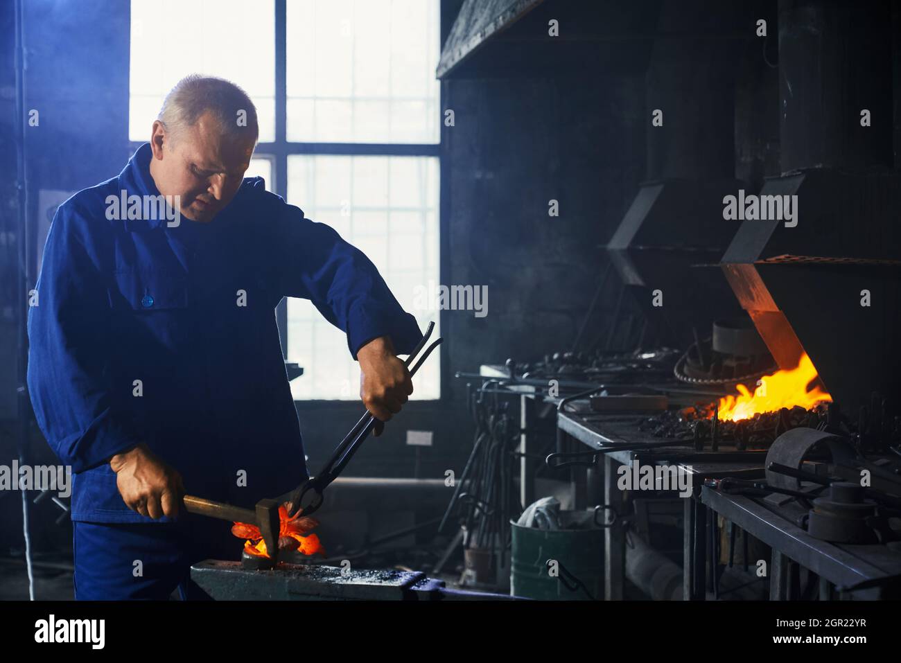 Metal forge worker hi-res stock photography and images - Alamy