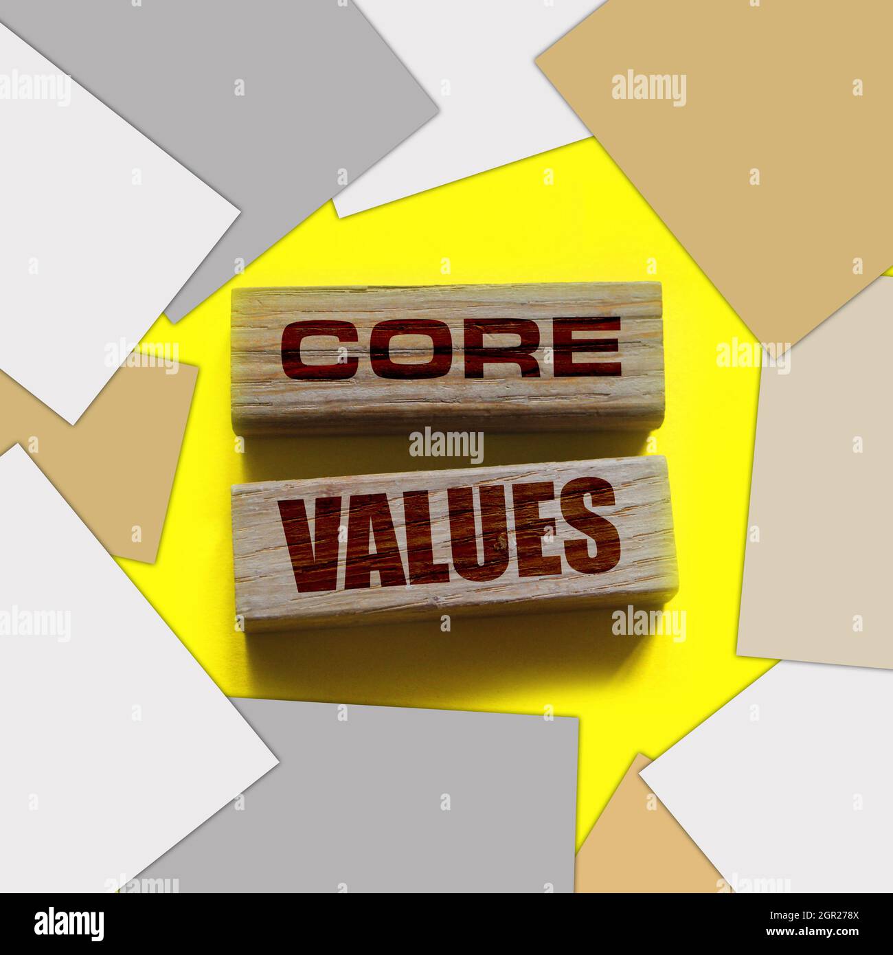 core values words on wooden blocks on yellow background. Business ...