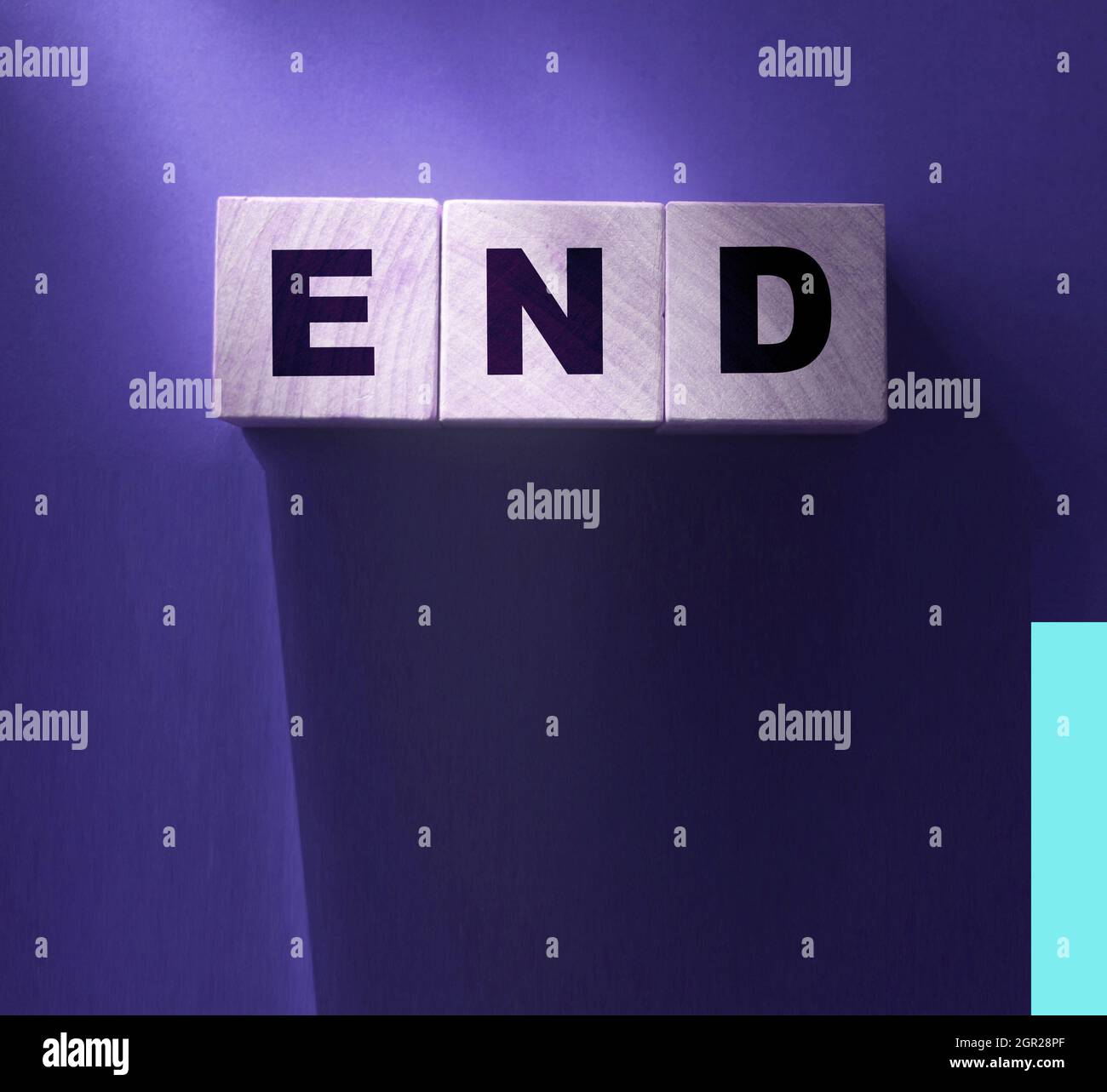 End word on wooden cubes on red. Finishing business project concept ...