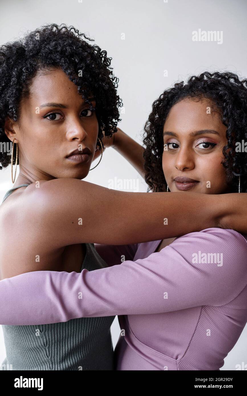 Two Black Women Hugging Each Other High Resolution Stock Photography ...