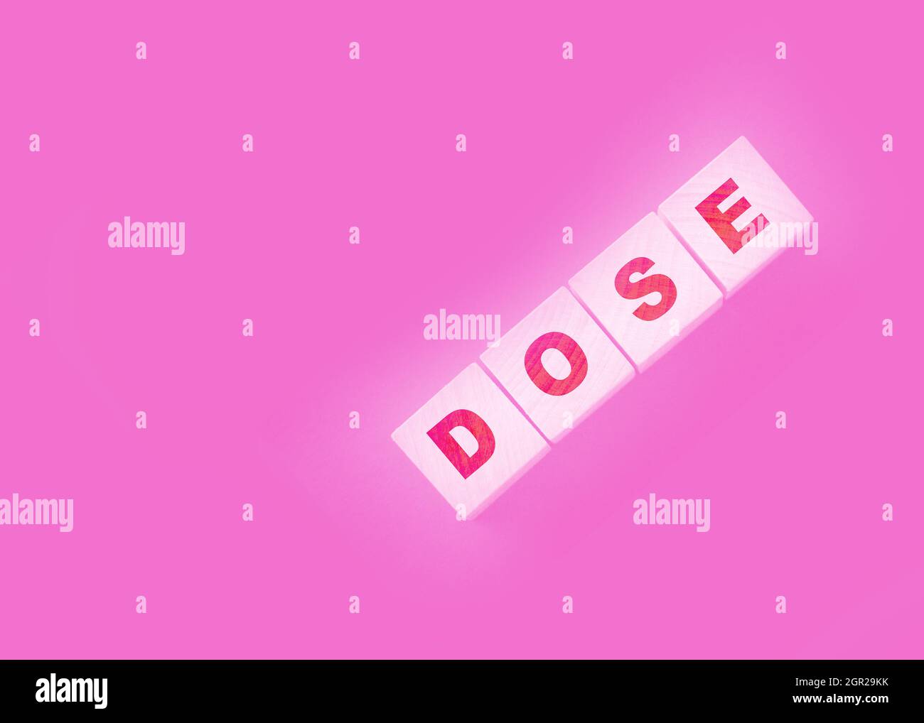 Wooden blocks with the word Dose. Medical concept Stock Photo - Alamy