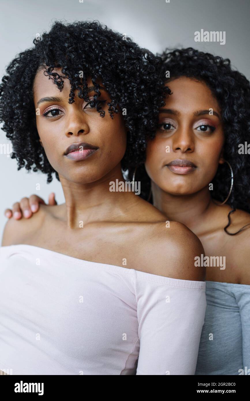 Two Black Women Hugging Each Other High Resolution Stock Photography ...