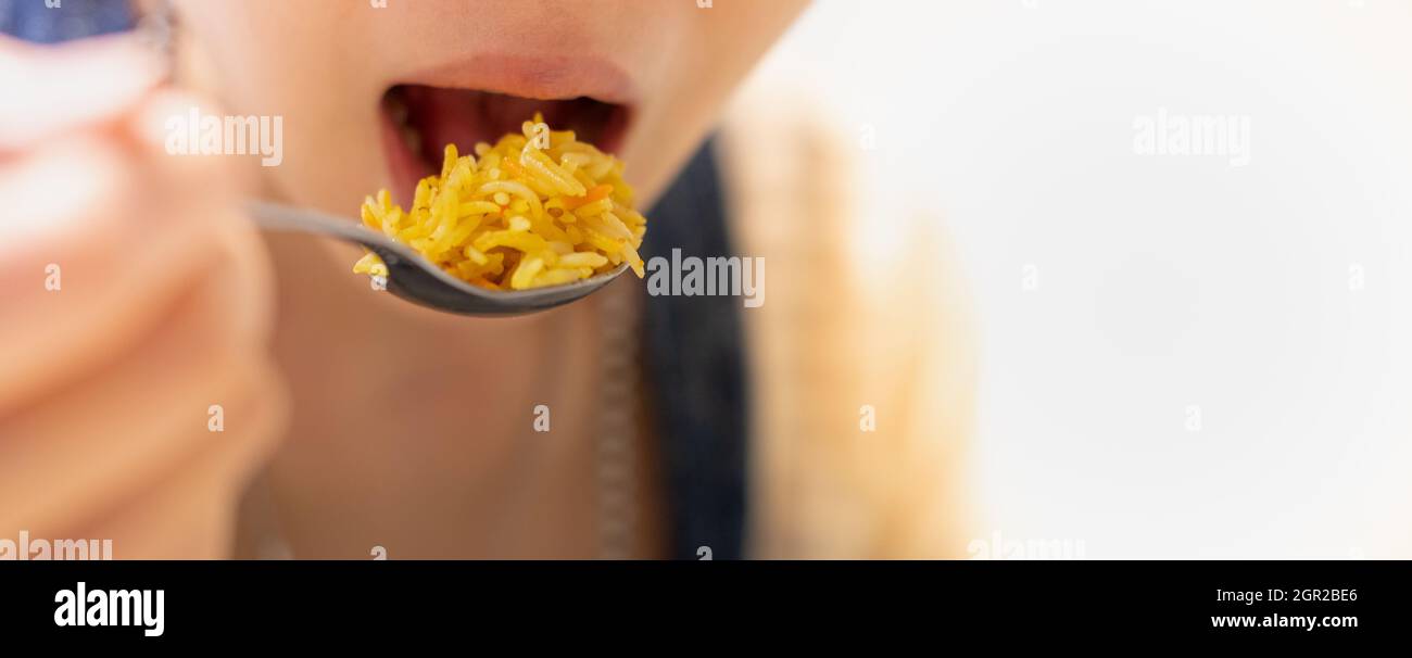 Hand spoon lips hi-res stock photography and images - Alamy