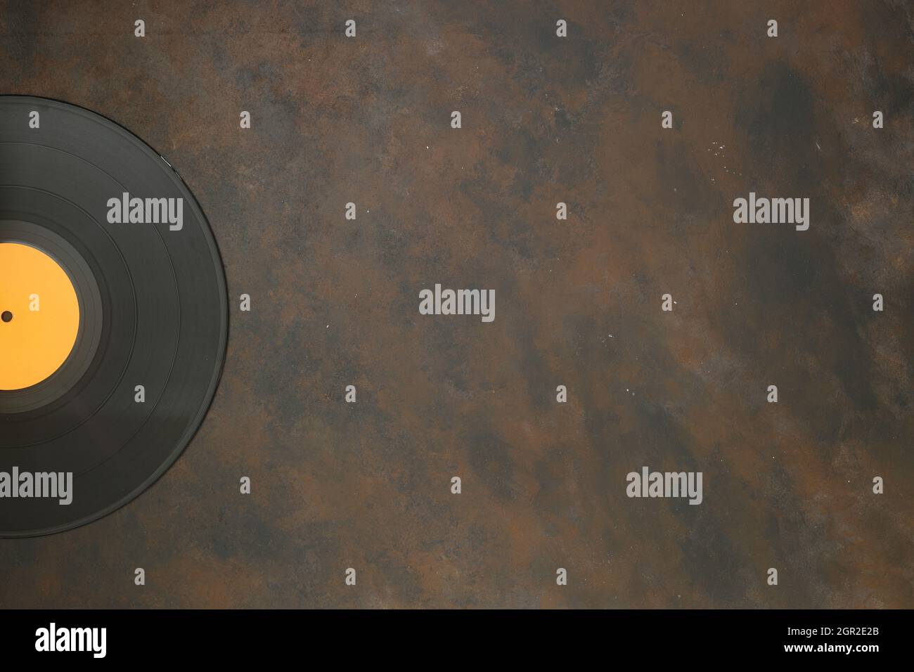 Vinyl record on a rusty background. Retro style. Top view Stock Photo ...