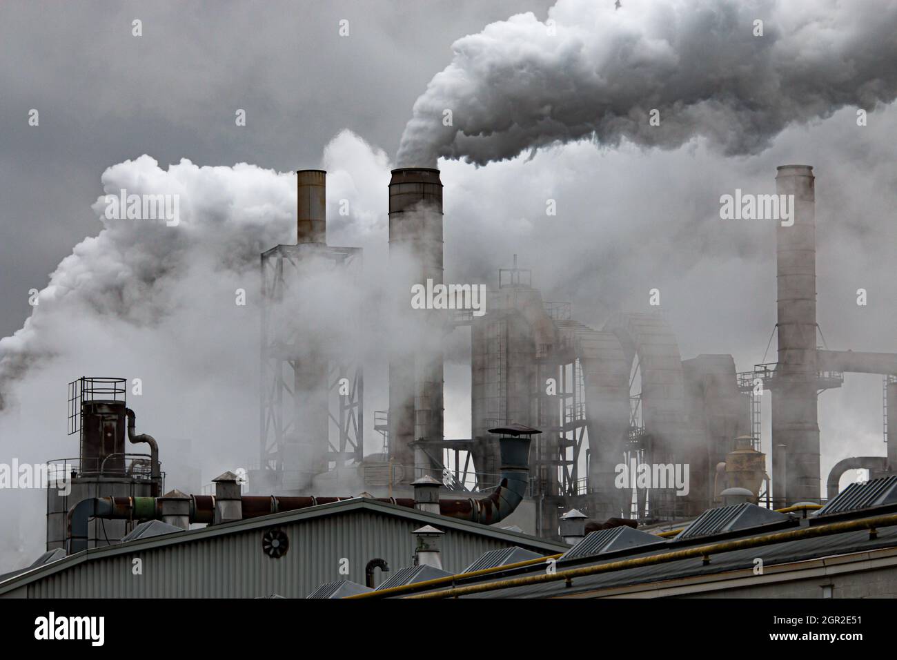 Breathtaking shot of an industrial factory under the cloudy skies Stock ...