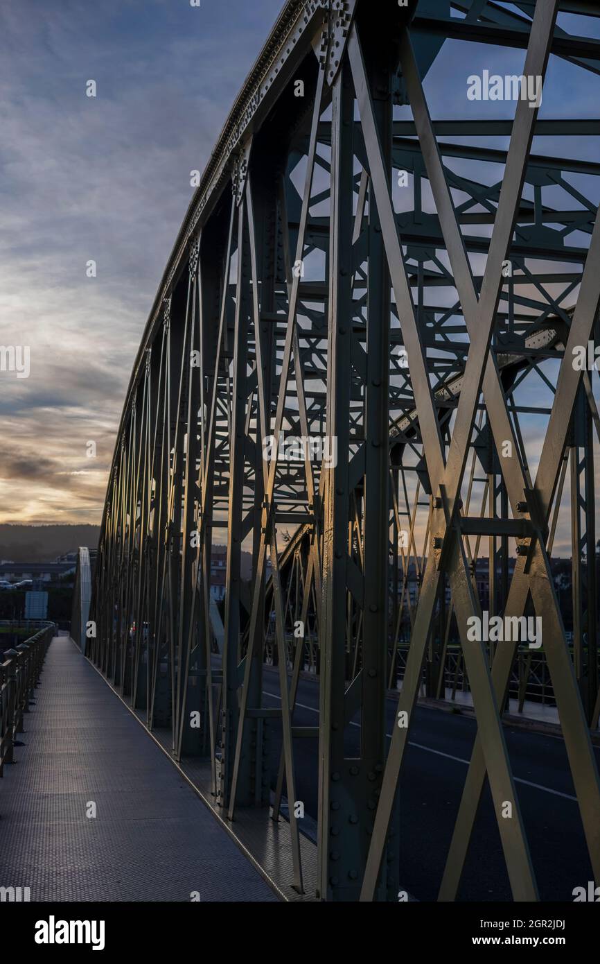 View of the iron bridge over Ason river estuary, in the marshes of ...