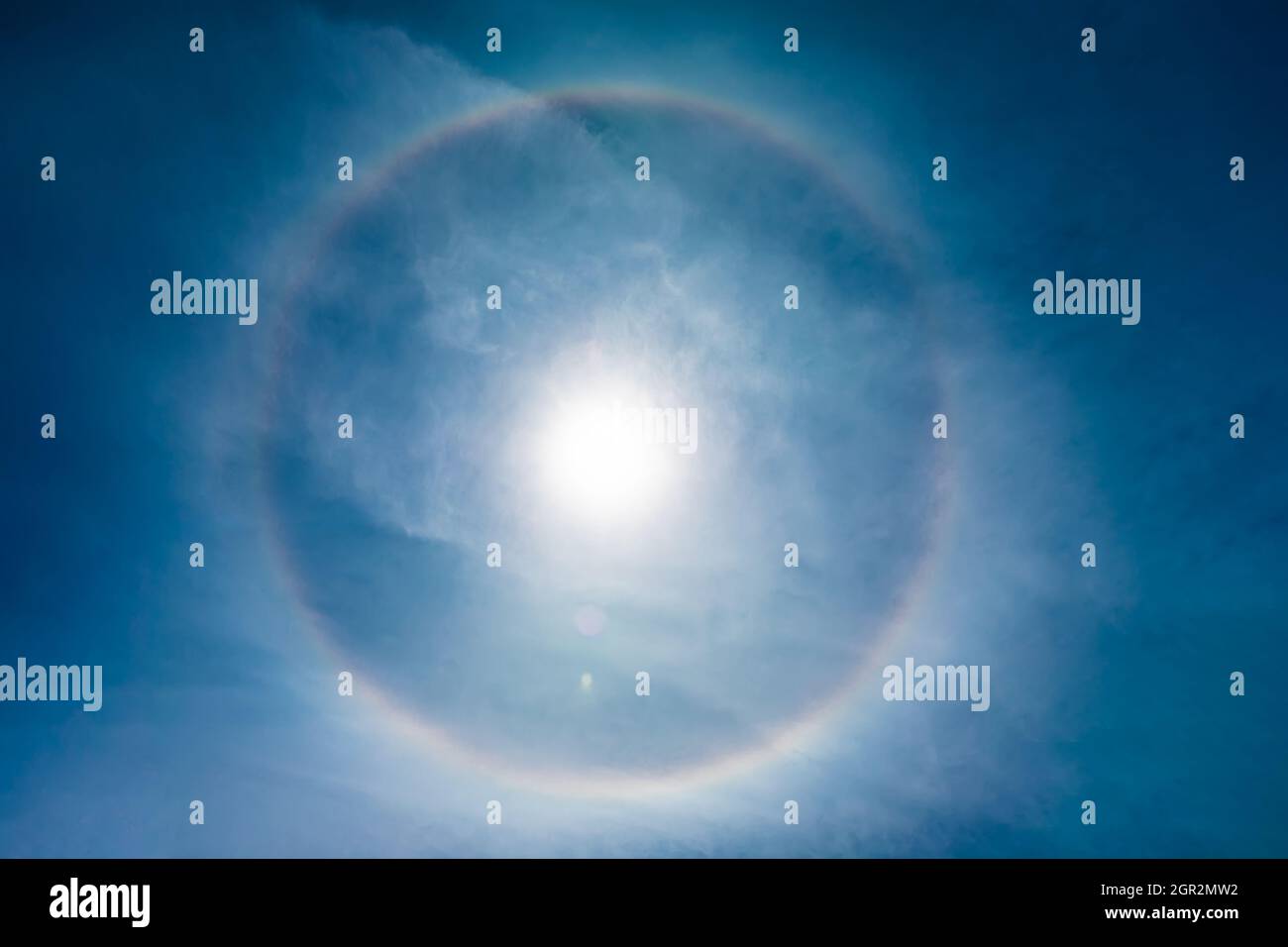 Solar halo, optical phenomenon produced by light interacting with ice ...