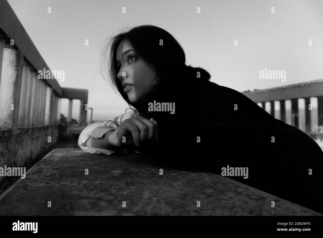 Leaning on hand Black and White Stock Photos & Images - Alamy