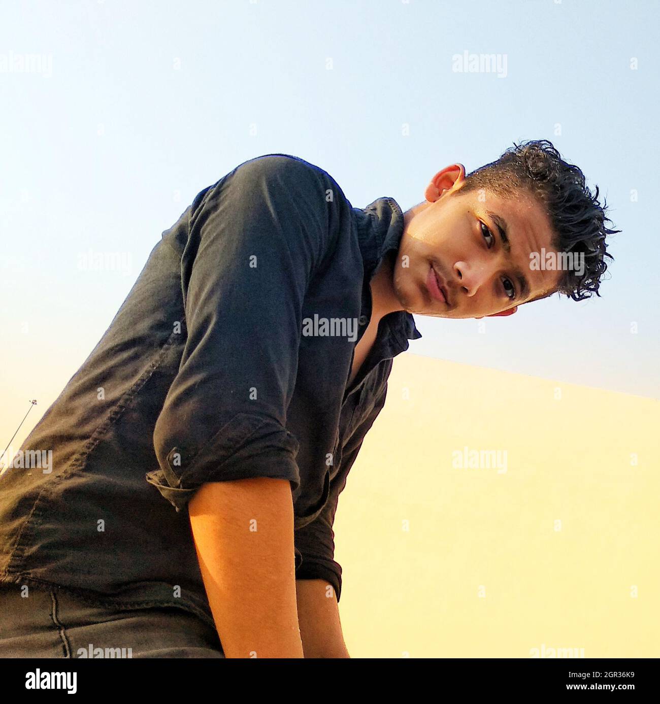 Handsome boy modeling hi-res stock photography and images - Alamy