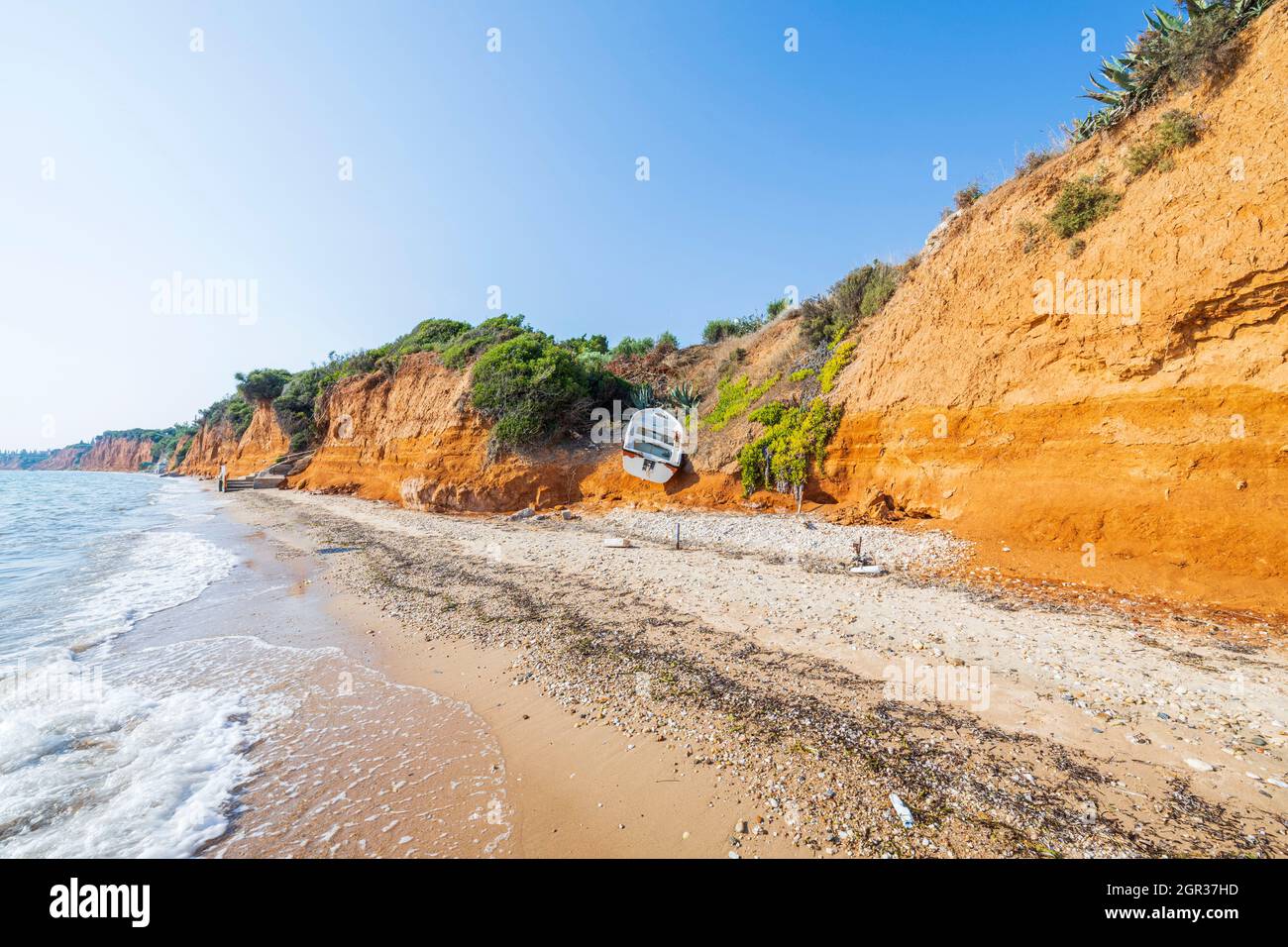 Beautiful nature landscape view with abandoned boat on cliff. Greece ...