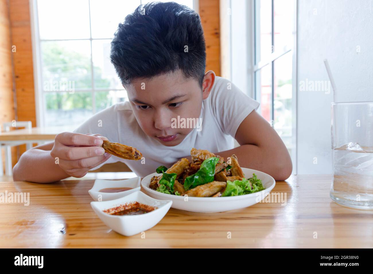 Boy chicken sandwich hi-res stock photography and images - Alamy