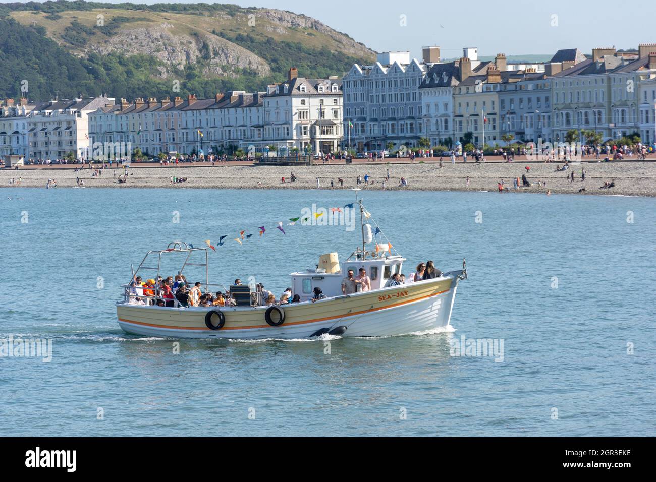 Sea jay boats boat harbour trips busy summer beach promenade san hi-res ...