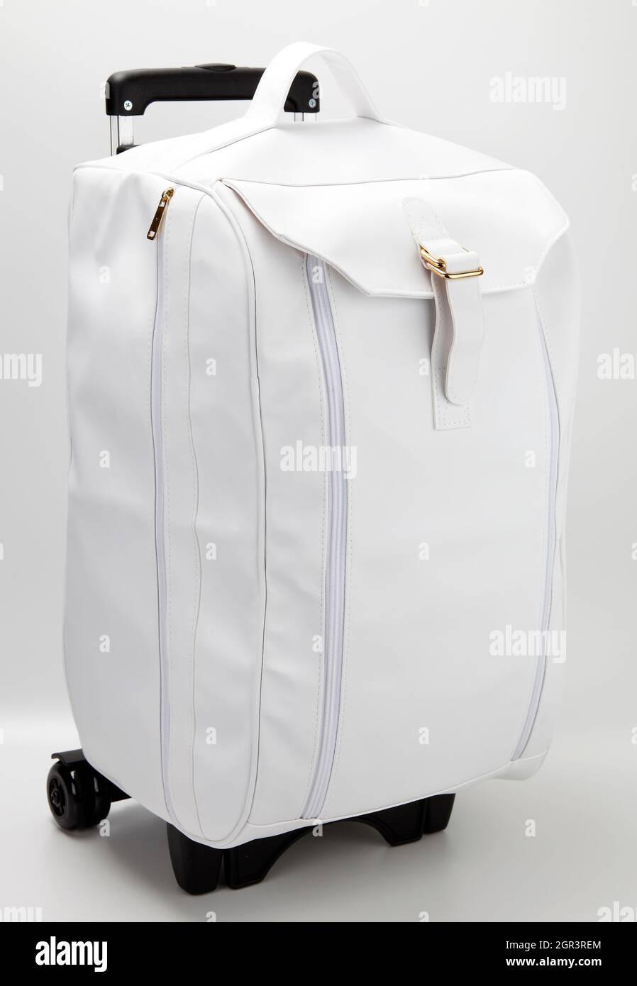 white suitcase with wheel Stock Photo - Alamy