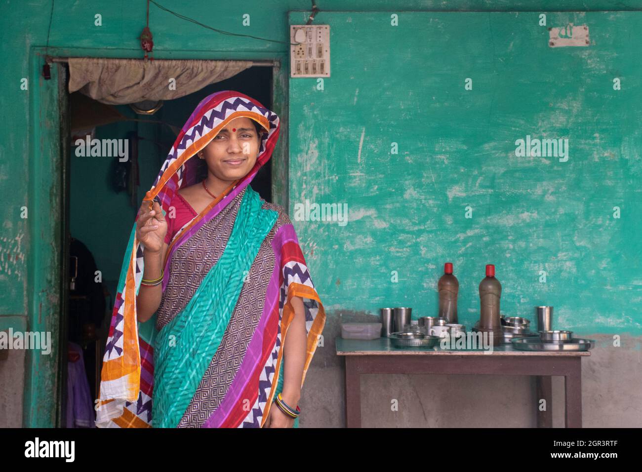 Indian woman covering face sari hi-res stock photography and images - Alamy