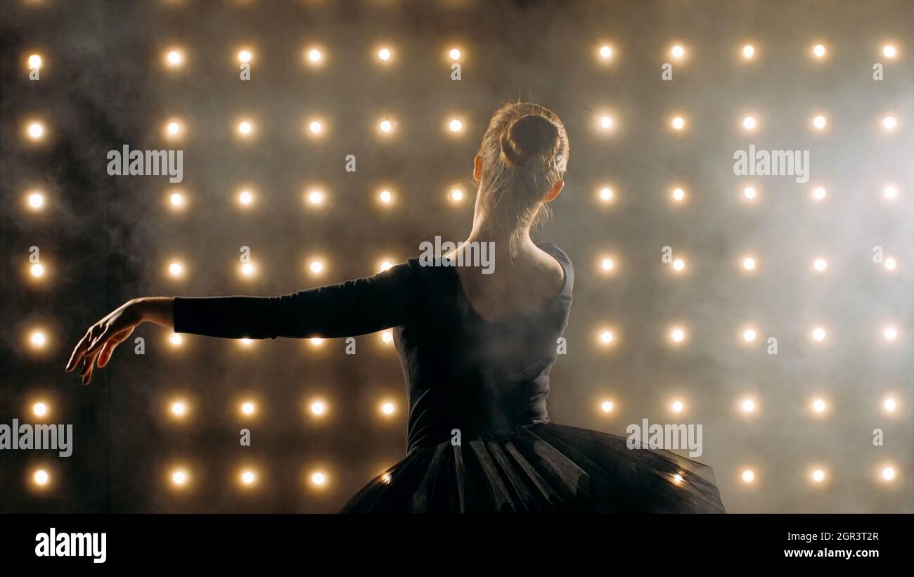 Women black silhouette long dress hi-res stock photography and images ...