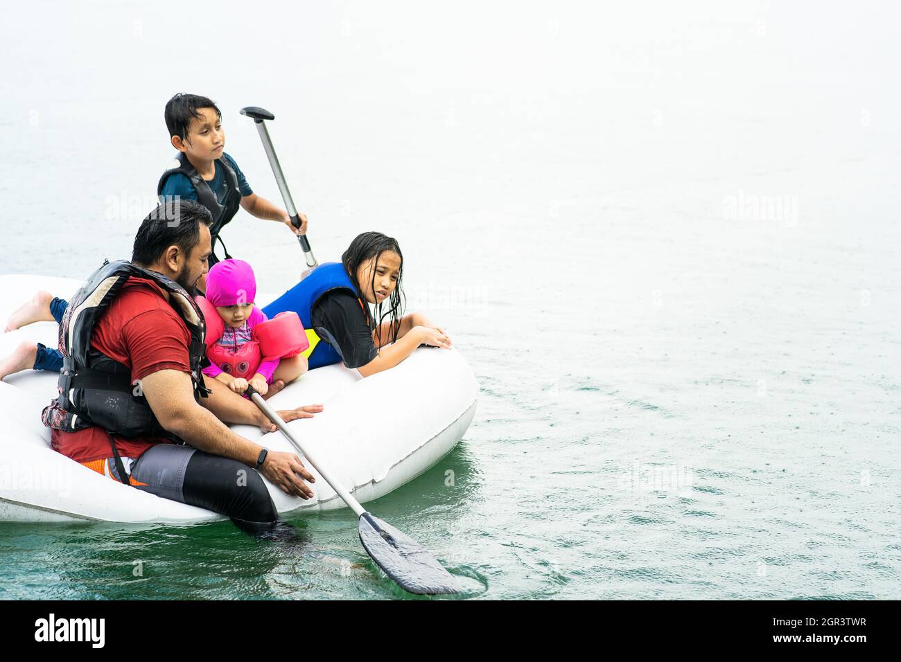 Family wearing life jacket in hi-res stock photography and images - Alamy
