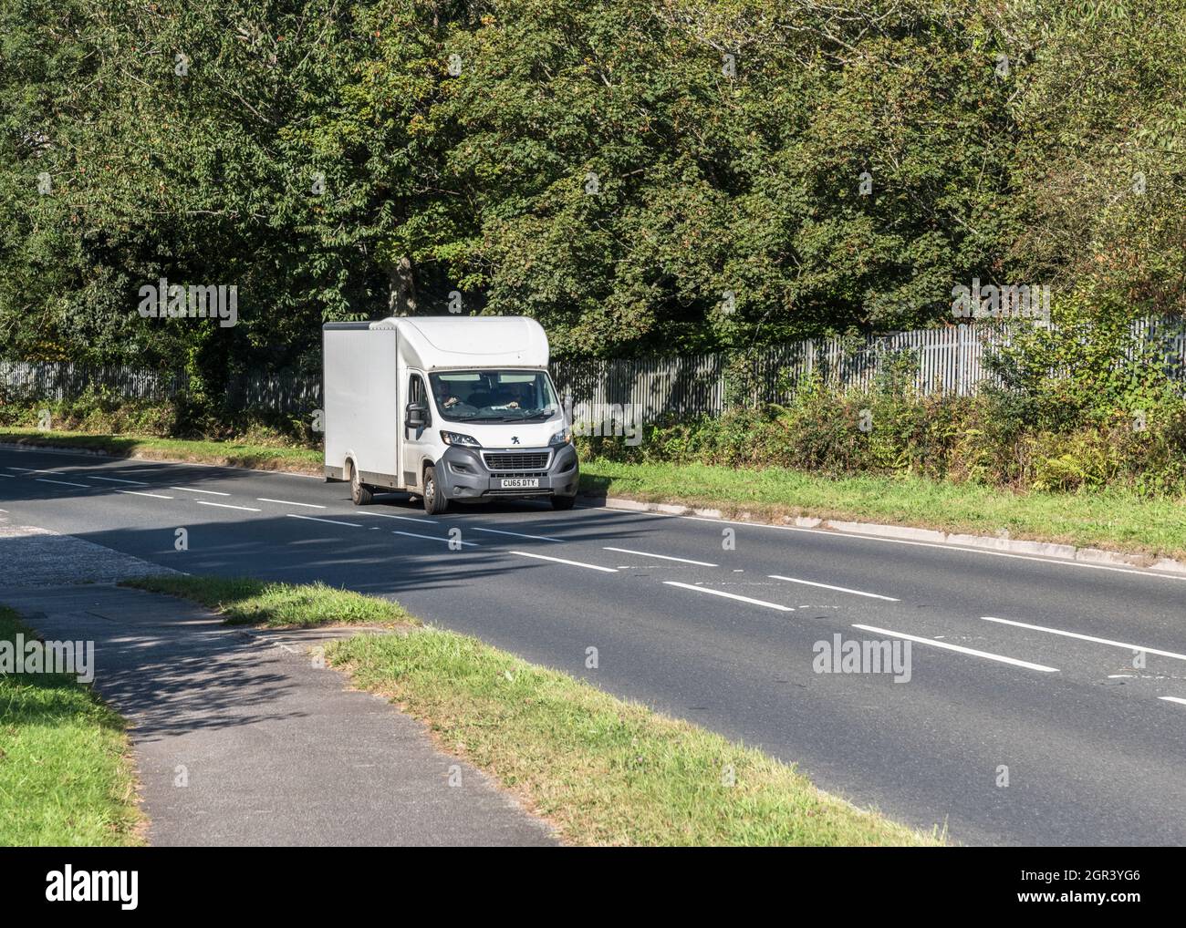 Solitary white lorry on country road hi-res stock photography and ...