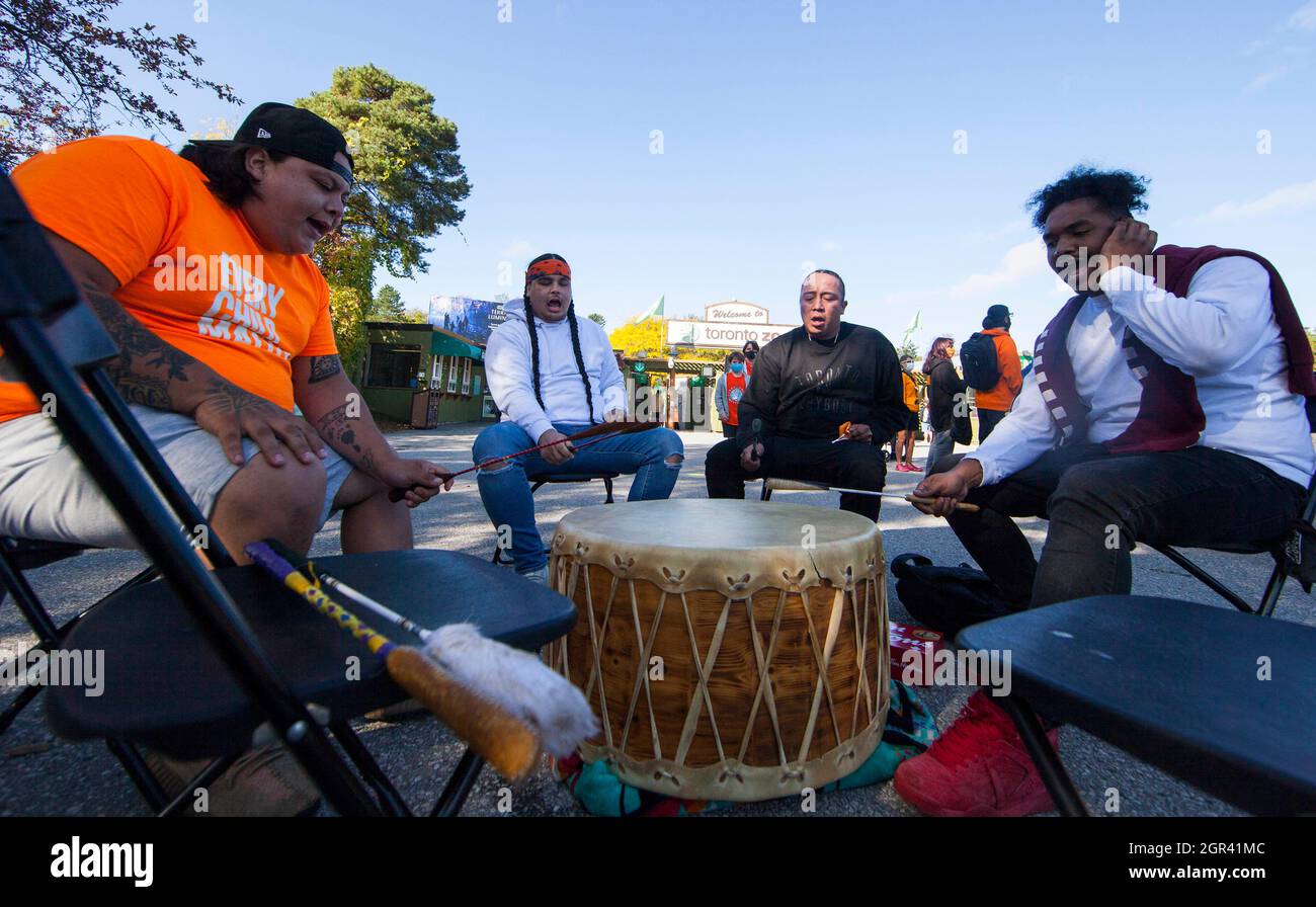 Toronto, Canada. 30th Sep, 2021. An indigenous band performs at a ...