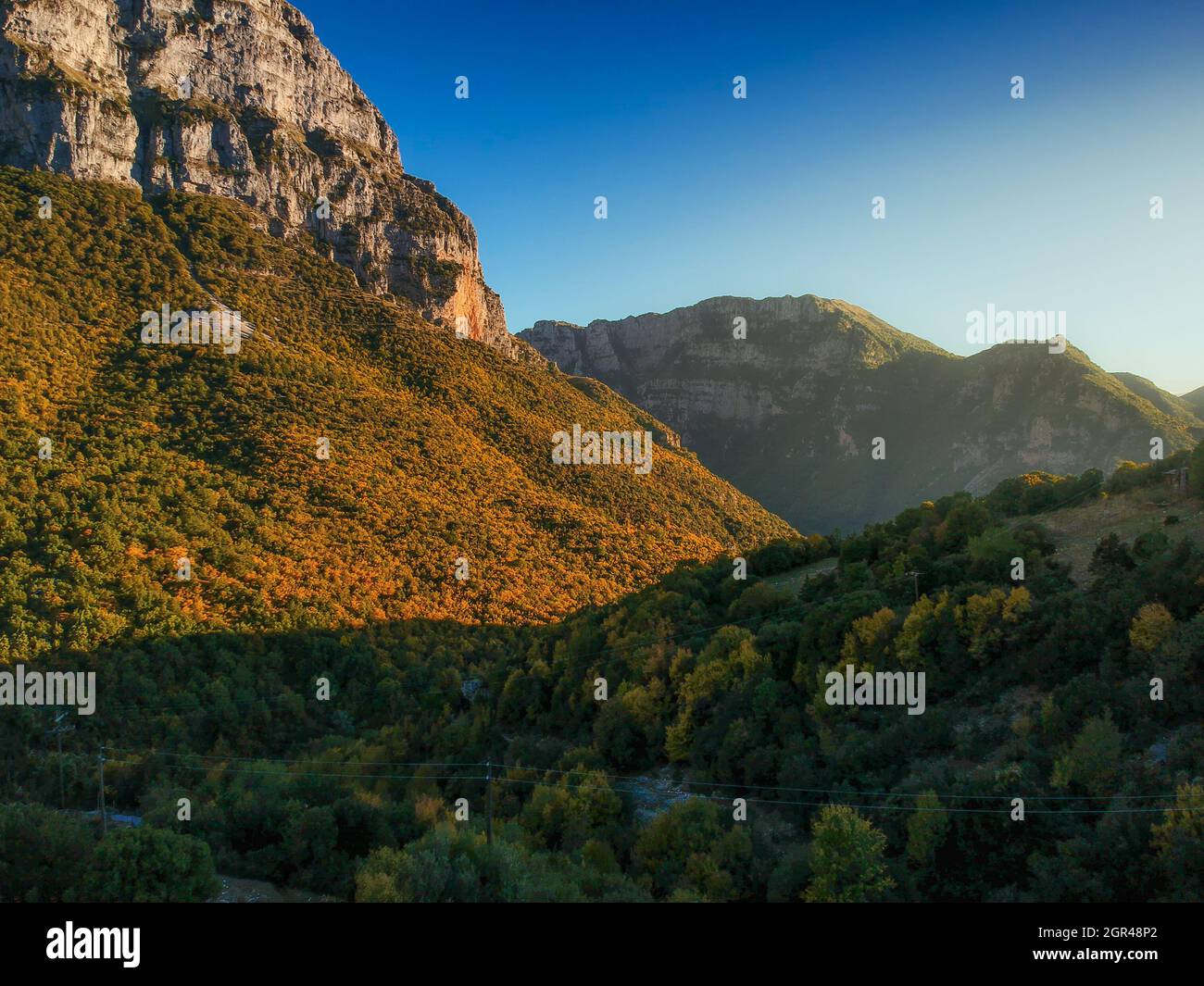 Aerial panoramic view over the picturesque village Papigo in Epirus ...